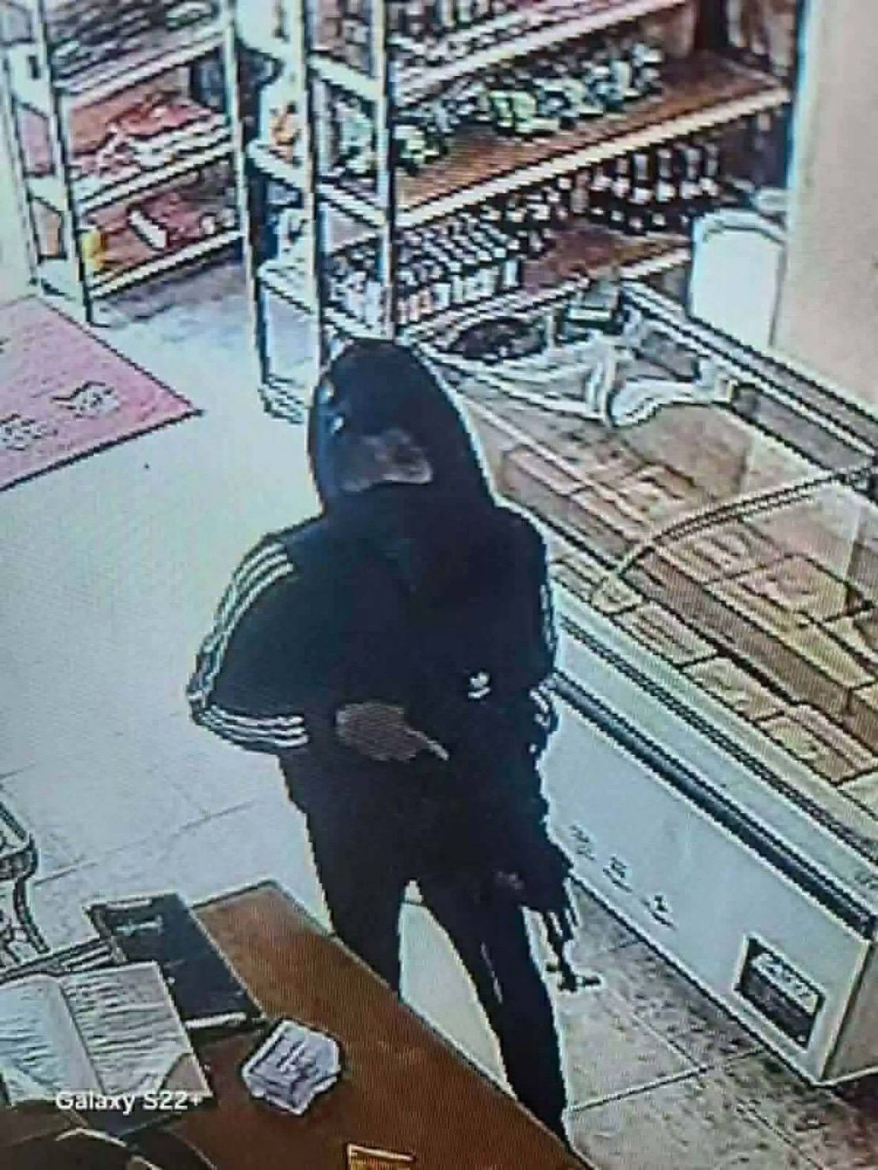 Brazen Black-Clad Gang Armed with Guns Kidnaps Money Exchange Shop ...